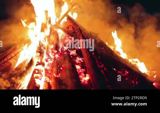 Big Campfire is Burning Down in Early Morning or Evening against the ...