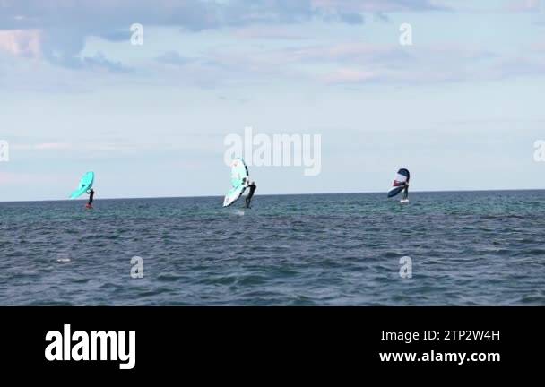 Modern water sport. Hydrofoil ride on the ocean using the wing and the ...