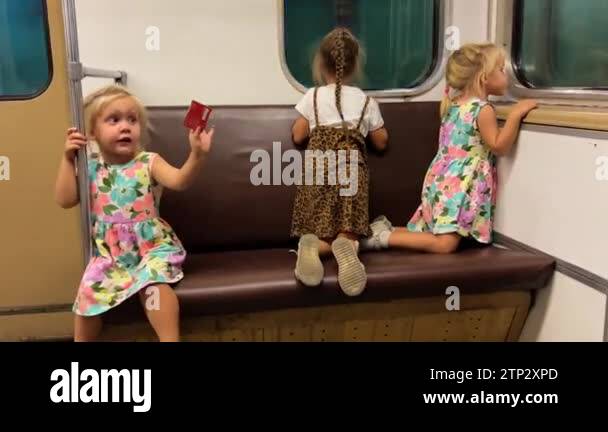 Little Girls Kids Sisters Ride On The Subway. High quality 4k footage ...