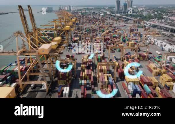 Forwards fly above large container terminal in seaport. Stacks of ...