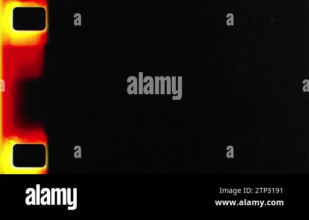 A vintage Super 8mm film frame overlay with a sprocket hole, dirt, hair ...