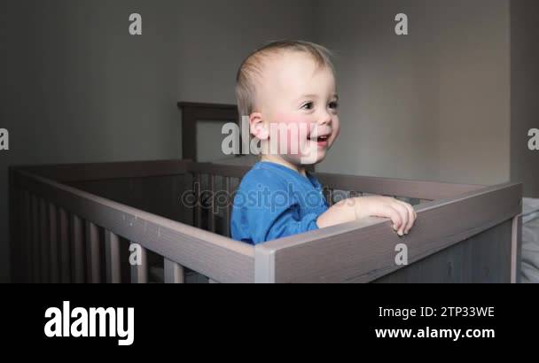 Crouching baby Stock Videos & Footage - HD and 4K Video Clips - Alamy