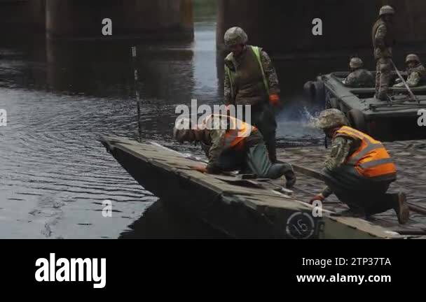 Pontoon bridge of the Ukrainian army. Installation of a temporary ...