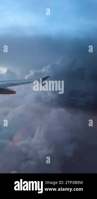 Aircraft Wing Flying in Sky Clouds Lightning Strike. High quality ...