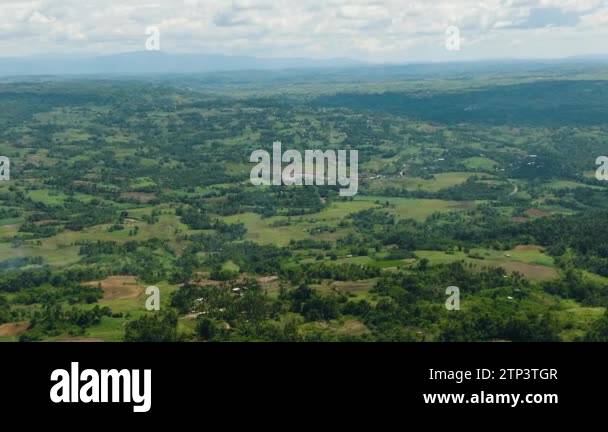Top view of slopes of mountains and hills with forest and agricultural ...