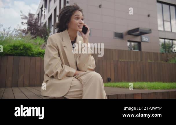 Woman Phone Call Conversation on Park Bench in Downtown, Businesswoman ...