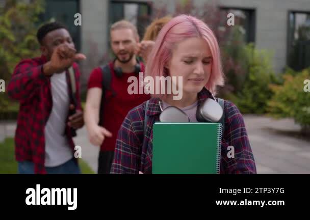 Group multiracial students teens classmates showing thumb down mock ...