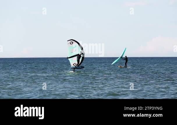 Modern water sport. Hydrofoil ride on the ocean using the wing and the ...