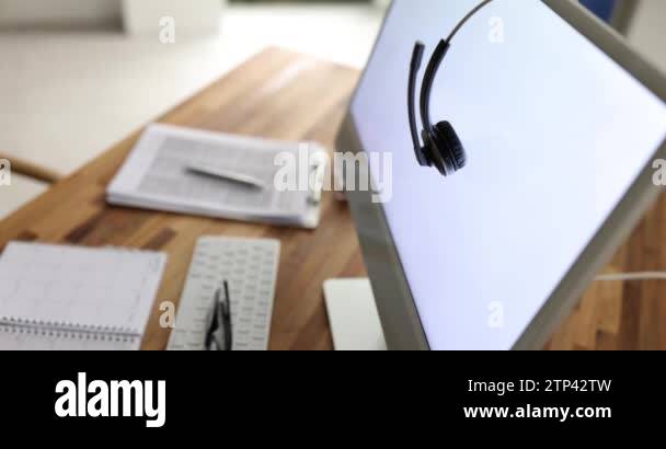 Office desk with computer and stationery for remote work. Paper diaries ...