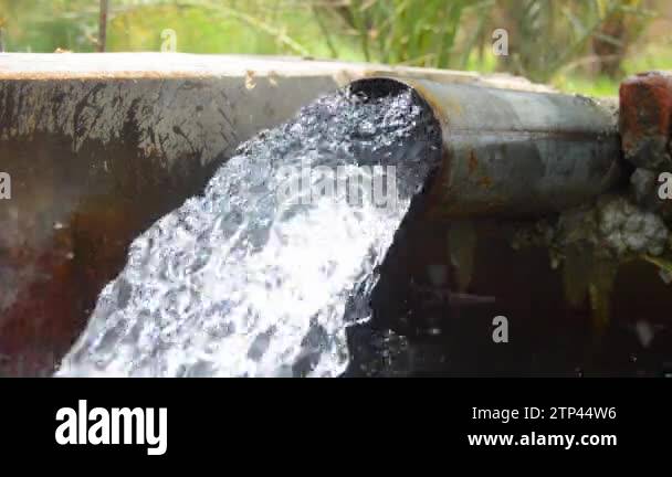 FHD footage of water coming out from tube well pipe. Concept of ...