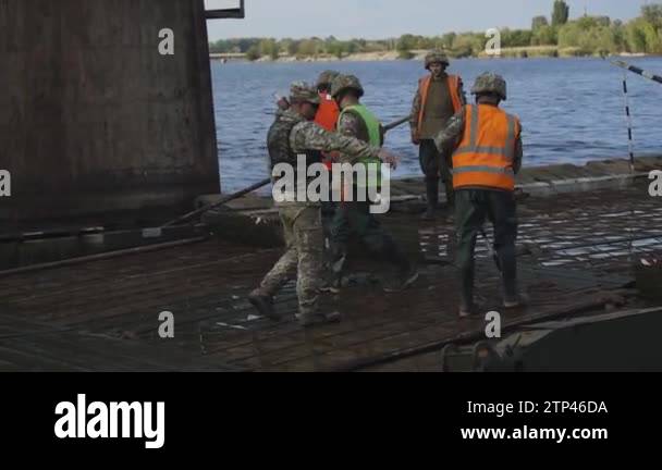 Pontoon bridge of the Ukrainian army. Installation of a temporary ...