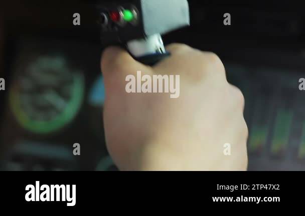 Pilot of military fighter pushing launch button on control stick, war ...