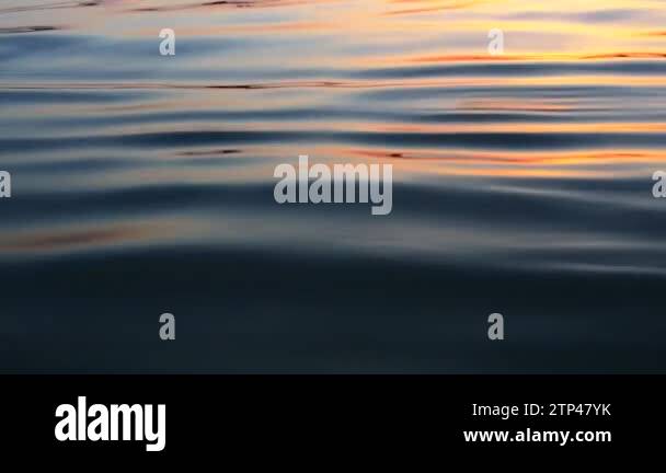 Calm water with ripples and smooth waves. Water texture. Water surface ...
