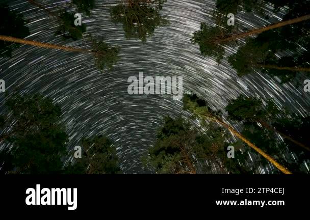 Stars move around a polar star. Time lapse of Star trails in the night ...