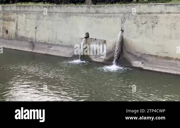 Discharge of wastewater into the river in an industrial area in the ...