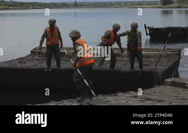 Pontoon bridge of the Ukrainian army. Installation of a temporary ...