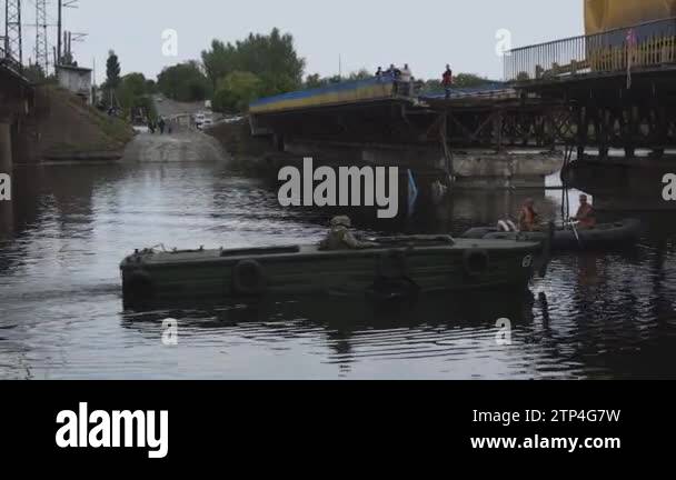 Pontoon bridge of the Ukrainian army. Installation of a temporary ...