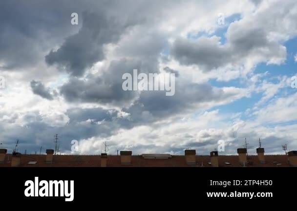 Beautiful torn clouds. Time lapse with high contrast. Cumulonimbus clouds, shower clouds, fast ...
