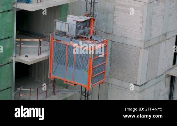 Elevator lifts for workers and construction materials at the ...