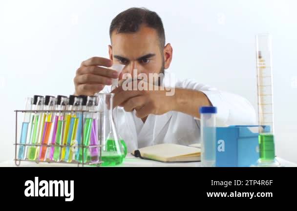 Scientist pouring liquid measuring beaker Stock Videos & Footage - HD ...