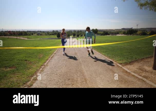 Woman reaching finish line Stock Videos & Footage - HD and 4K Video ...