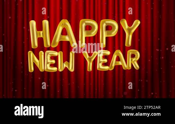 Happy new year written from gold foil balloons on a red curtain ...
