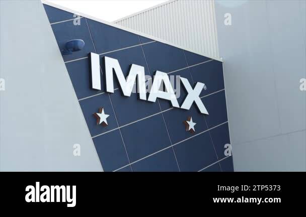imax sign logo with two stars on theater theatre wall outside outdoors ...