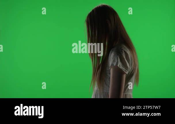 Medium side view green screen, chroma key video of a posessed female ...