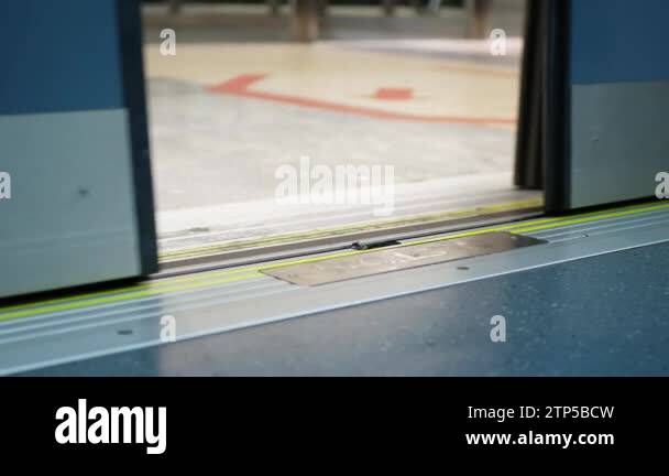 low angle view to the exit door gate of the subway's door train ...