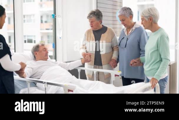 Hospital, praying and friends visit man for comfort, care and support ...