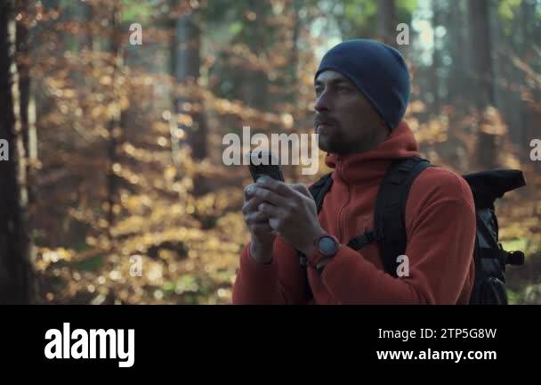 Maps outdoors while hiking. Hiker use smartphone to navigation in ...