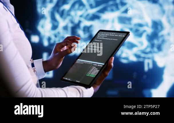 Professional Updating Ai Systems Writing Intricate Binary Code Scripts On Tablet Visualizing