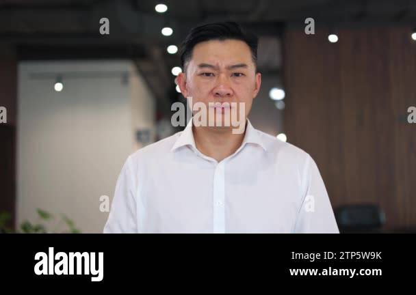 Front view of confused male professional looking at camera and not ...