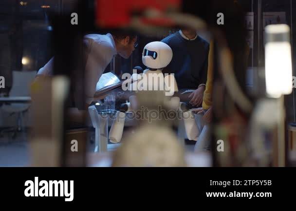 4K Electronics engineering team building robot with 3D printed ...