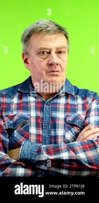 Disgruntled caucasian man says no as sign of disapproval looking at ...