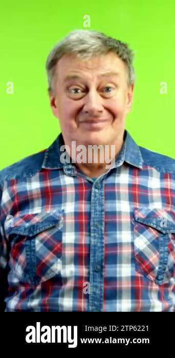 Positive caucasian man looking at camera nodding head answering yes ...