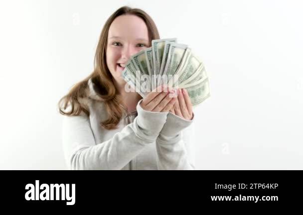 great joy of a teenager the first money earned a lot of dollars 100 ...