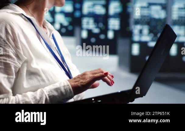 Precise professional working in server farm housing GPU dedicated ...