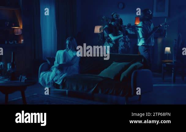 Video of two ghost hunters with a smartphone and detector looking for ...