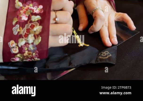 Korean traditional letter writing captured with a shimmering golden ...