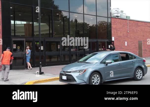 shopping mall exterior entrance doors windows in black with reflection ...