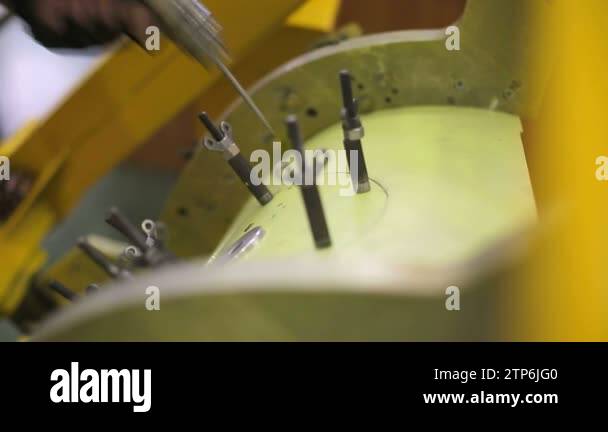 Drilling holes in body parts of aircraft and install bolts tightening ...