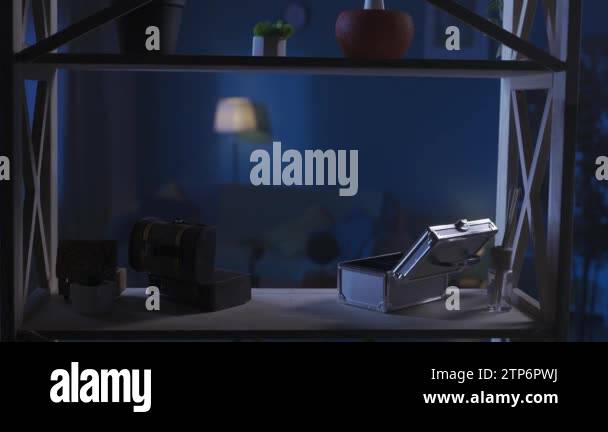 Video with a frame capturing the room from the shelf. There are empty ...