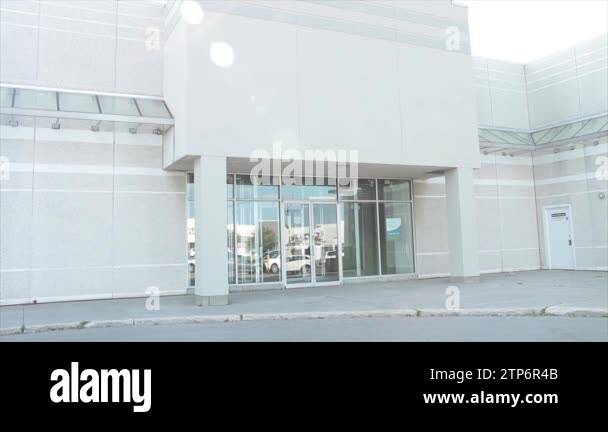 vacant generic empty store storefront beige white clean with no sign or ...