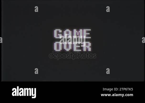 retro videogame GAME OVER text on computer old tv glitch interference ...