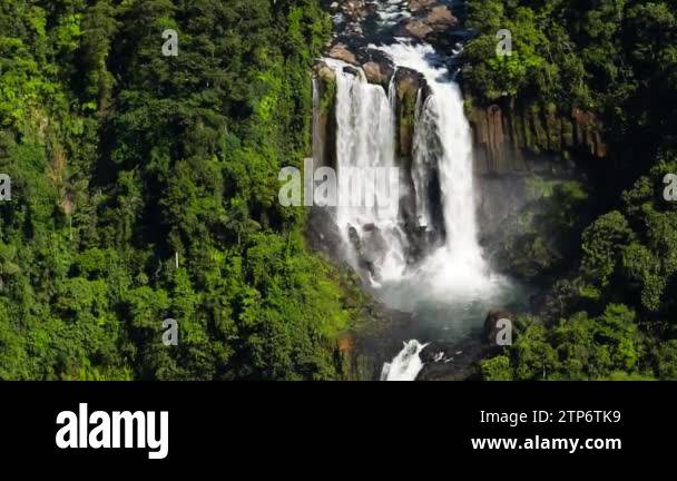 Limunsudan Falls with white water stream over rocks. Mindanao ...