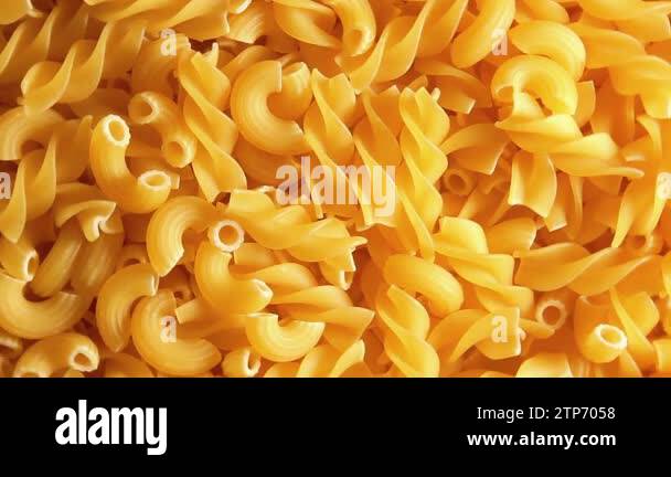 Uncooked Fusilli and Chifferi Rigati Pasta - Top View. Fat and ...
