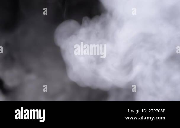 Plumes of Thick Icy Clouds of Smoke or Steam Fill the Space in Blurry ...
