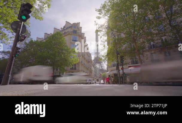 Time lapse. Romantic cozy view of the famous Eiffel tower from a small ...