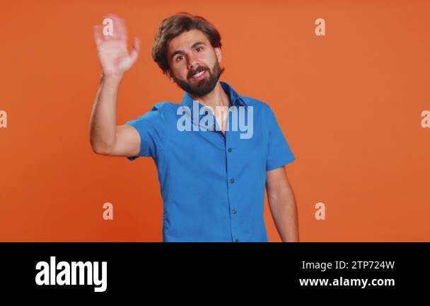 Come here, join us. Welcome. Attractive man showing inviting gesture ...